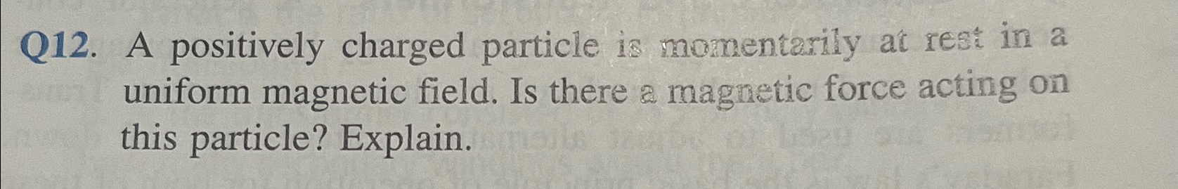 Solved Q12. ﻿A positively charged particle is momentarily at | Chegg.com