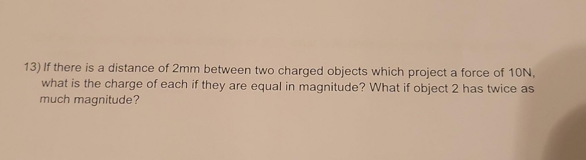 Solved 13) If there is a distance of 2 mm between two | Chegg.com