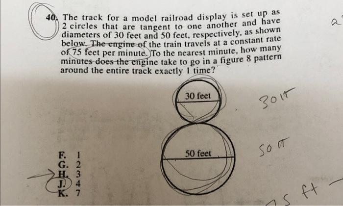 Solved The track for a model railroad display is set up as 2 | Chegg.com