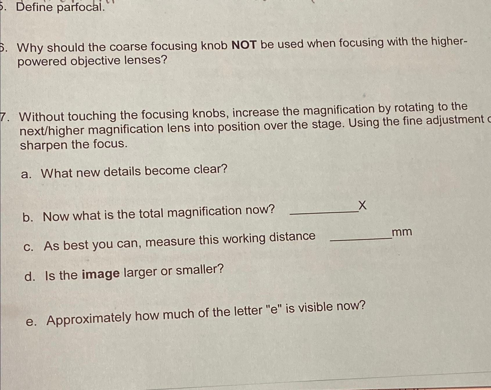 Define parfocal.Why should the coarse focusing knob | Chegg.com
