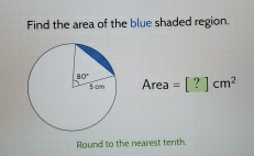 Find the area of the blue shaded region.Round to the | Chegg.com