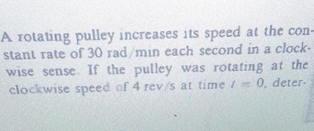 Solved A rotating pulley increases 1 ts speed at the con | Chegg.com