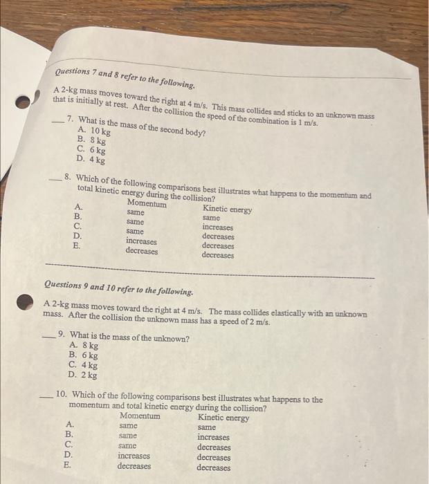 Solved Questions 7 and 8 refer to the following. A 2 - kg | Chegg.com