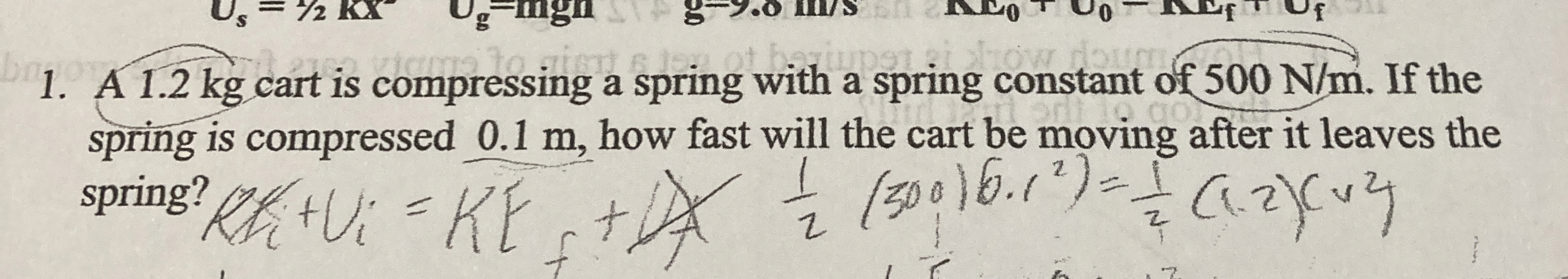 Solved by an EXPERT A 1.2 ﻿kg cart is compressing a spring with a spring | Chegg.com