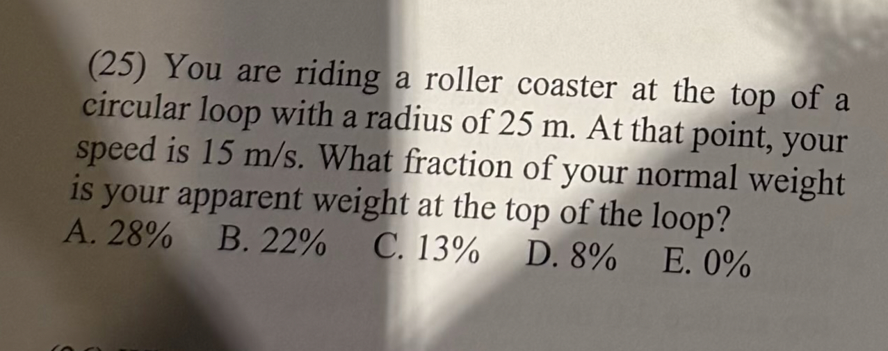 Solved (25) ﻿You are riding a roller coaster at the top of a | Chegg.com