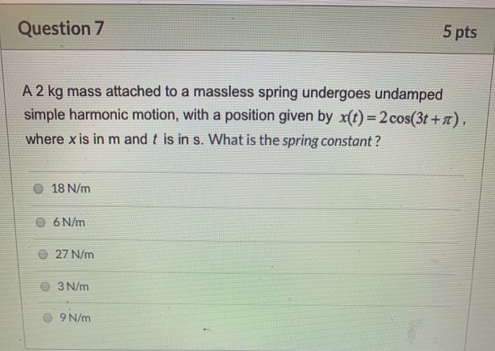 Solved A 2 kg mass attached to a massless spring undergoes | Chegg.com