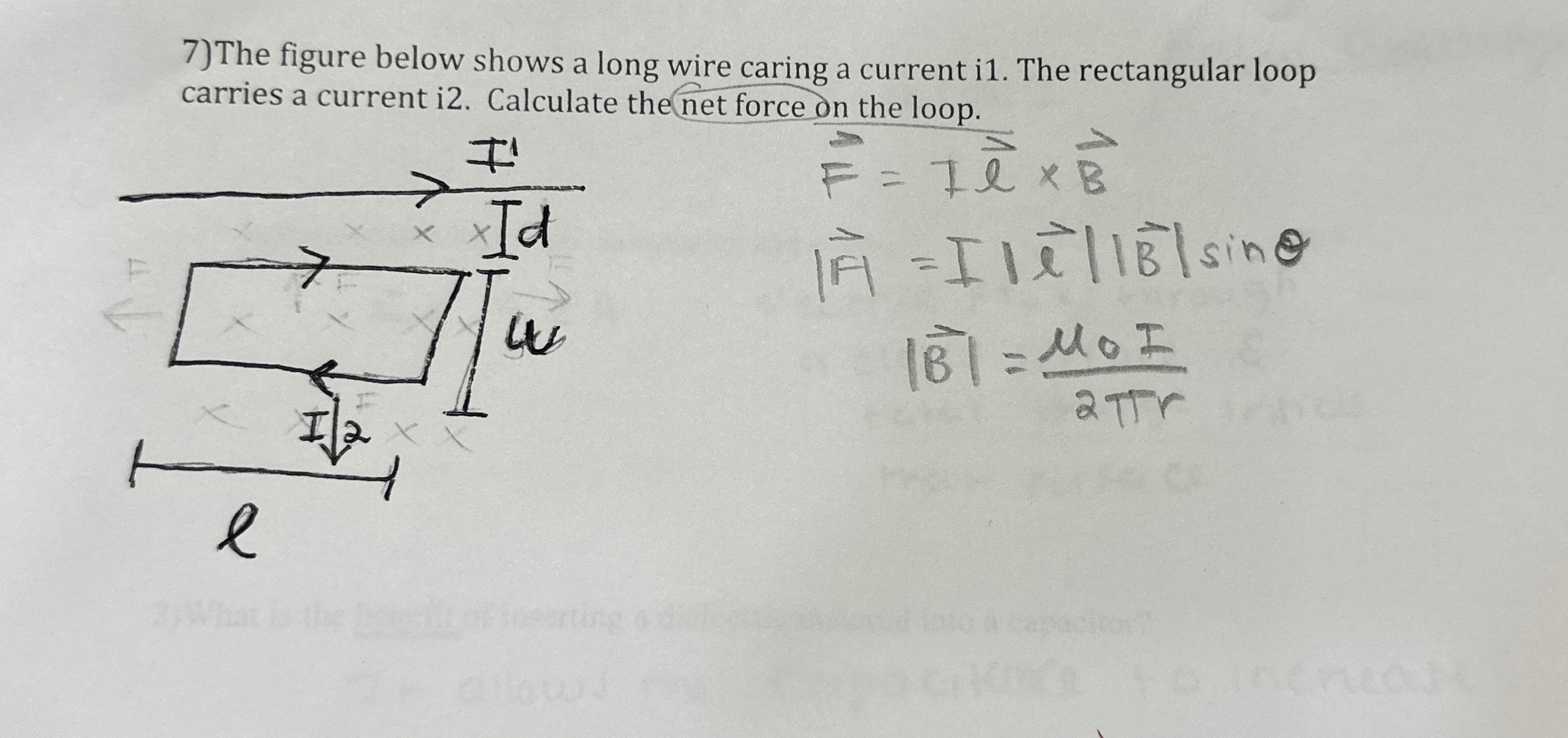 Solved The figure below shows a long wire caring a current | Chegg.com