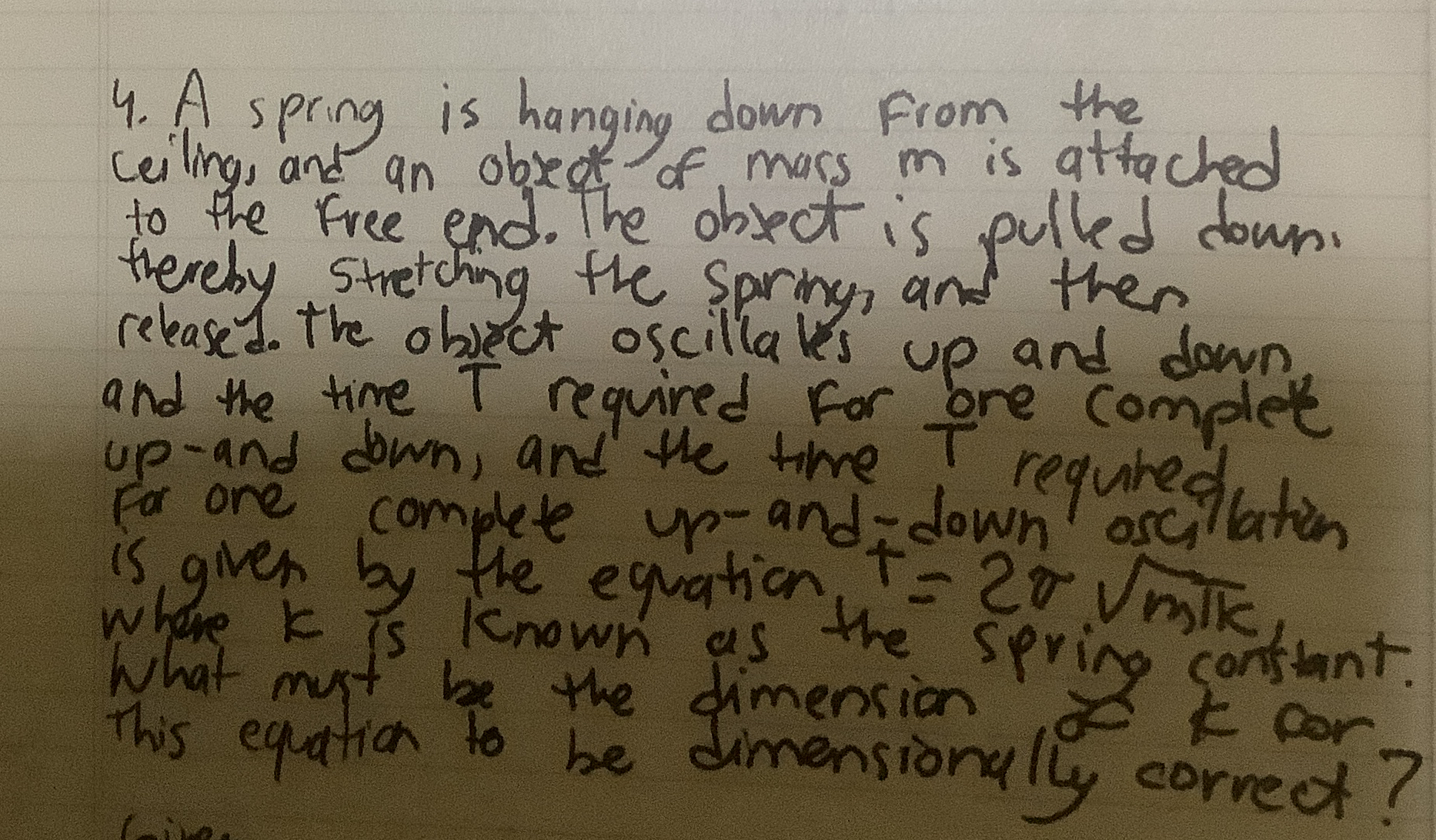 Solved A spring is hanging down from the ceiling, and an | Chegg.com