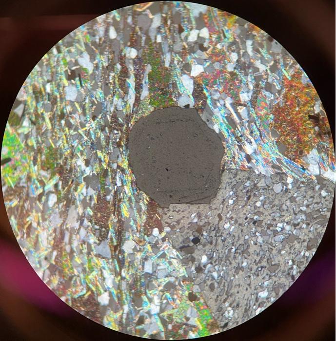 Solved The mineral is gray under crossed polar and does not | Chegg.com