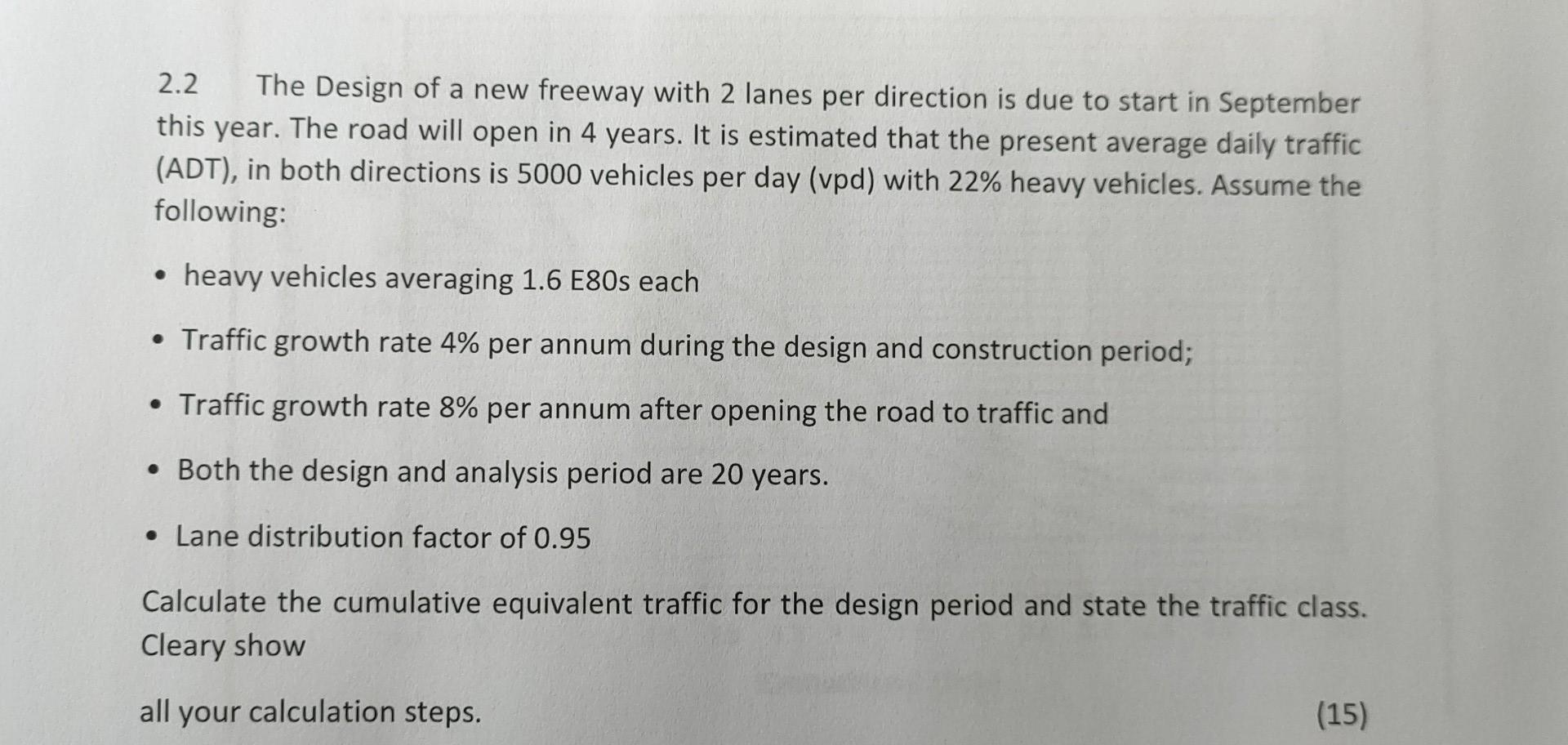Solved 2.2 The Design of a new freeway with 2 lanes per | Chegg.com