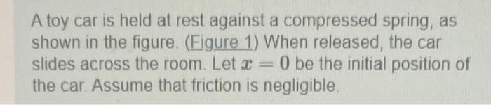 Solved A toy car is held at rest against a compressed | Chegg.com