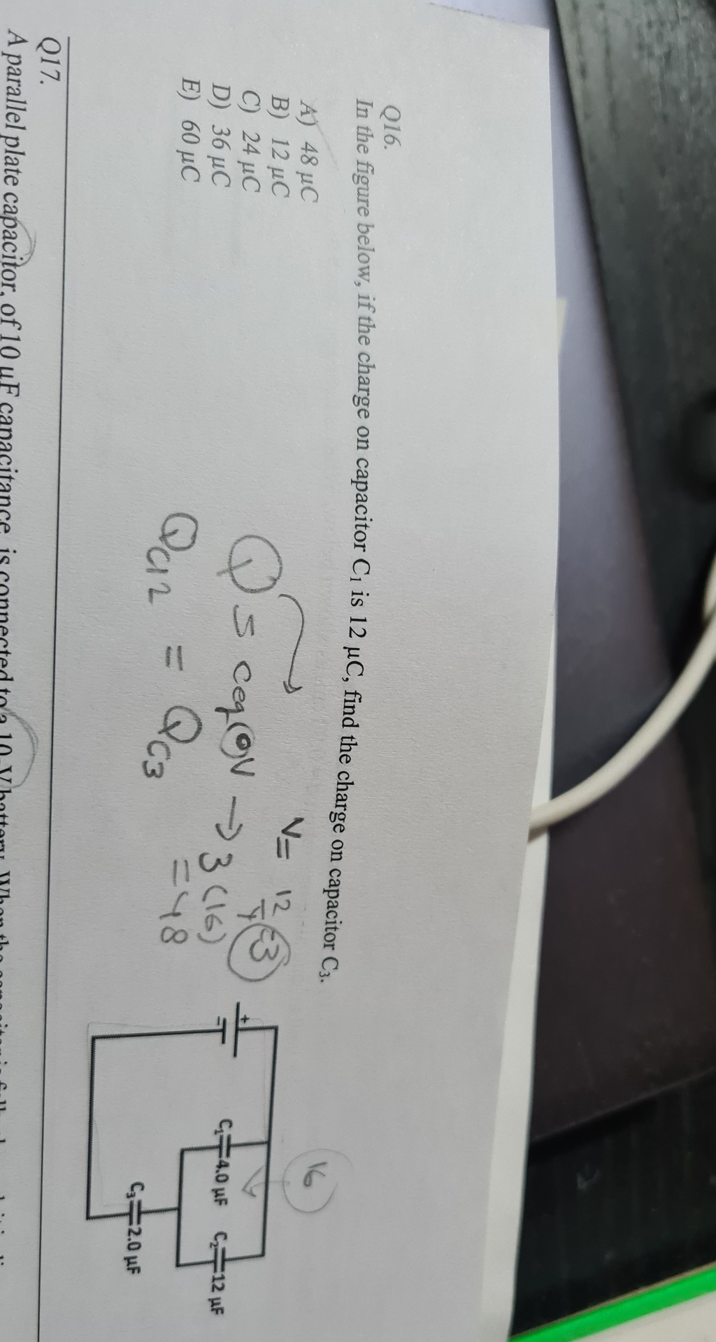 Solved Q16.In the figure below, if the charge on capacitor | Chegg.com