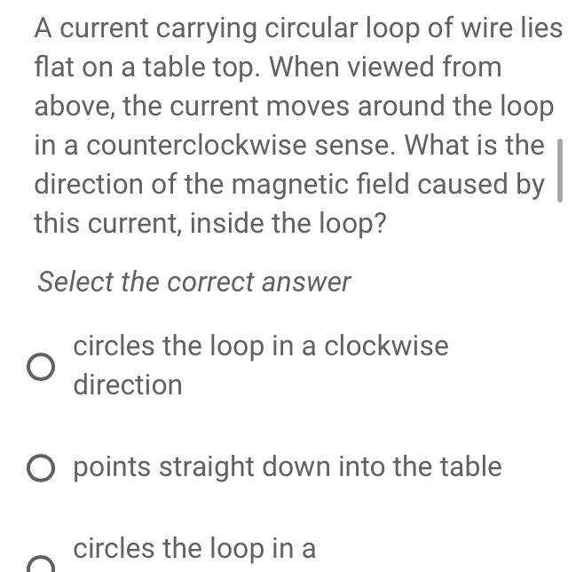 Solved A current carrying circular loop of wire lies flat on | Chegg.com