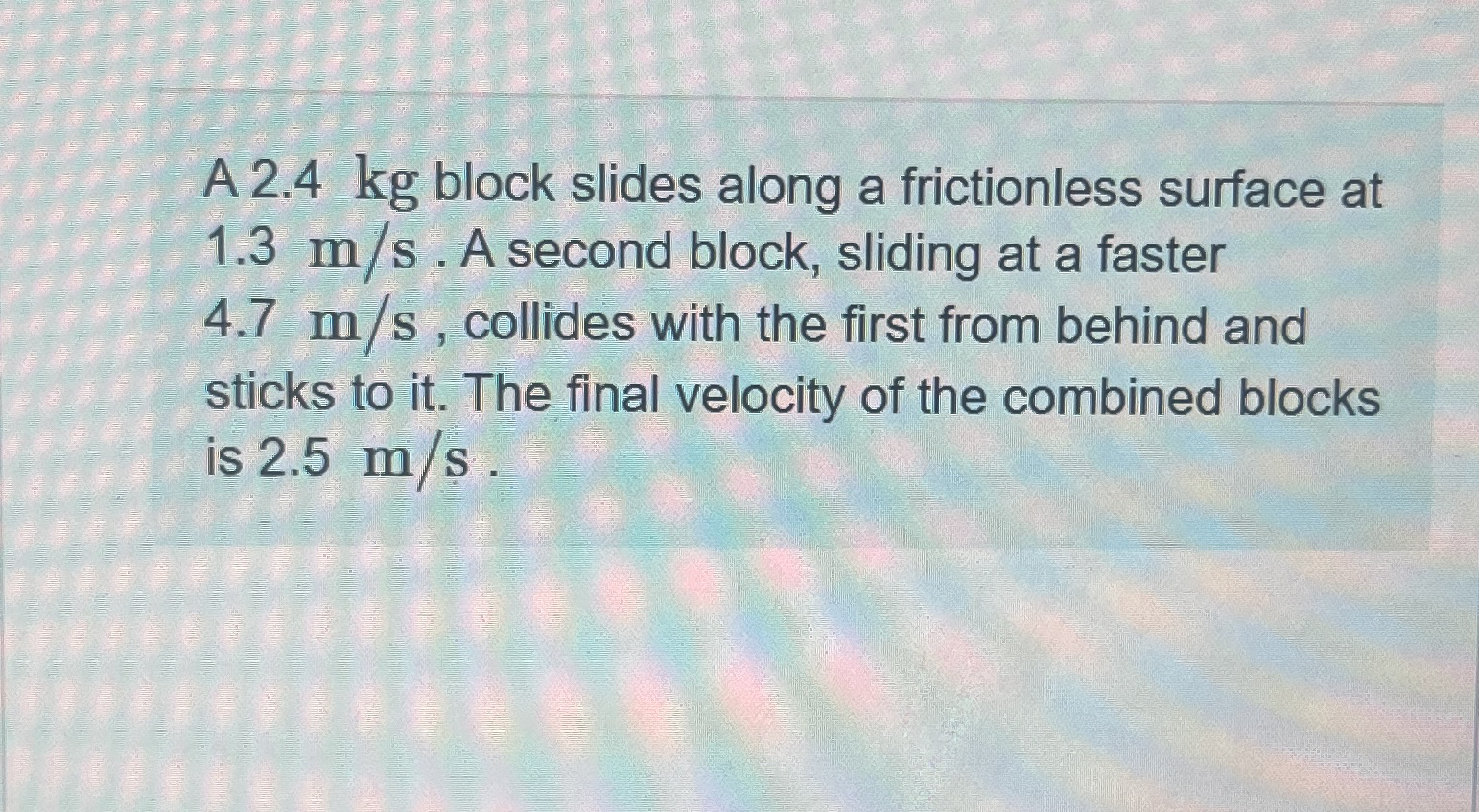 Solved A 2.4 ﻿kg block slides along a frictionless surface | Chegg.com