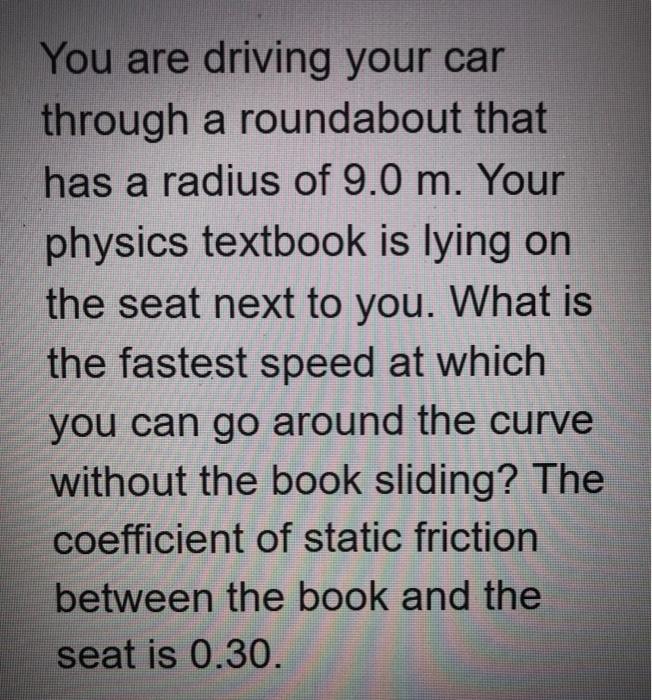 Solved You are driving your car through a roundabout that | Chegg.com