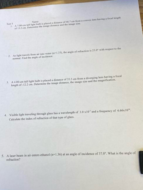 Solved Tet 4 ﻿Nane:A 7,00 -om tall light bulb is placed a | Chegg.com