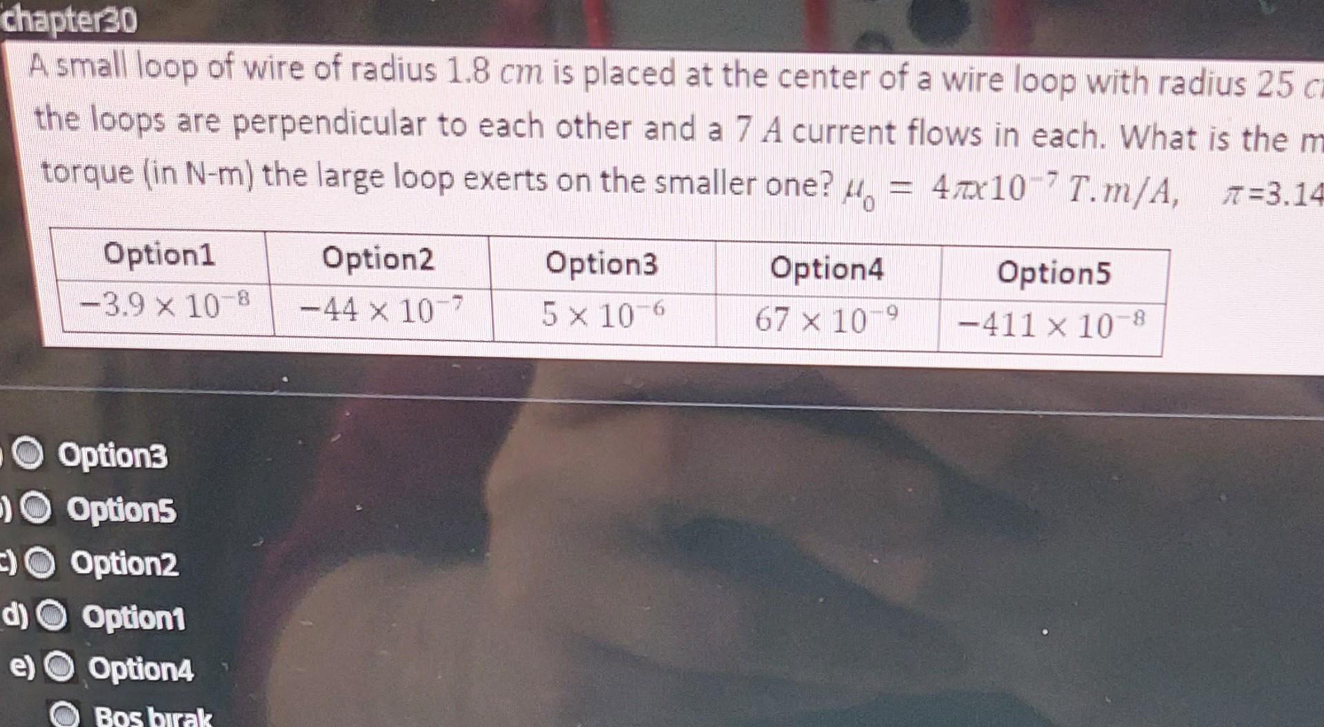Solved A small loop of wire of radius 1.8 cm is placed at | Chegg.com