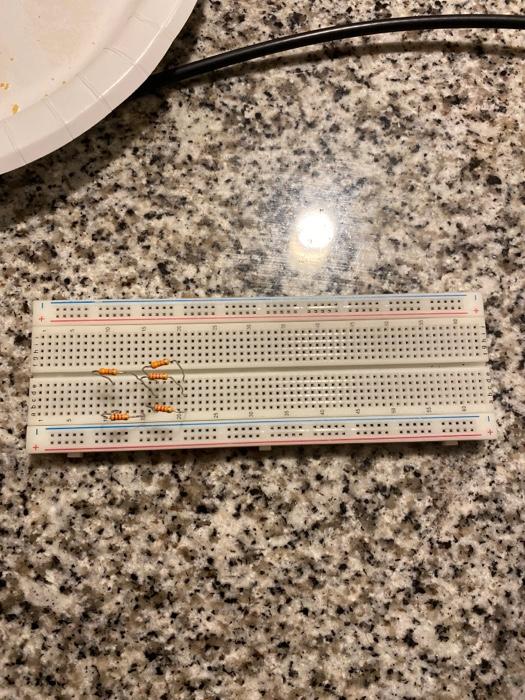 Solved Build the circuit below using a breadboard and | Chegg.com