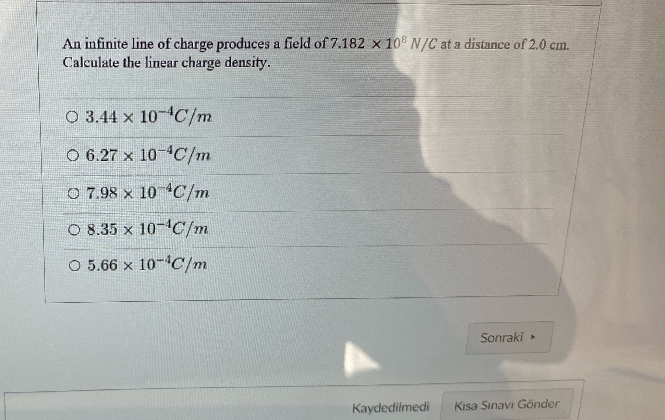 Solved An infinite line of charge produces a field of | Chegg.com