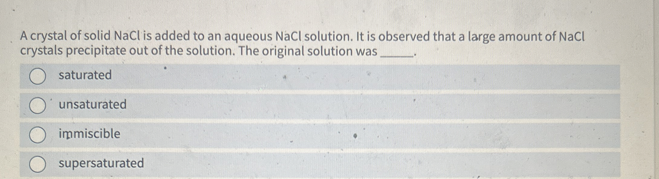 Solved A crystal of solid NaCl is added to an aqueous NaCl | Chegg.com