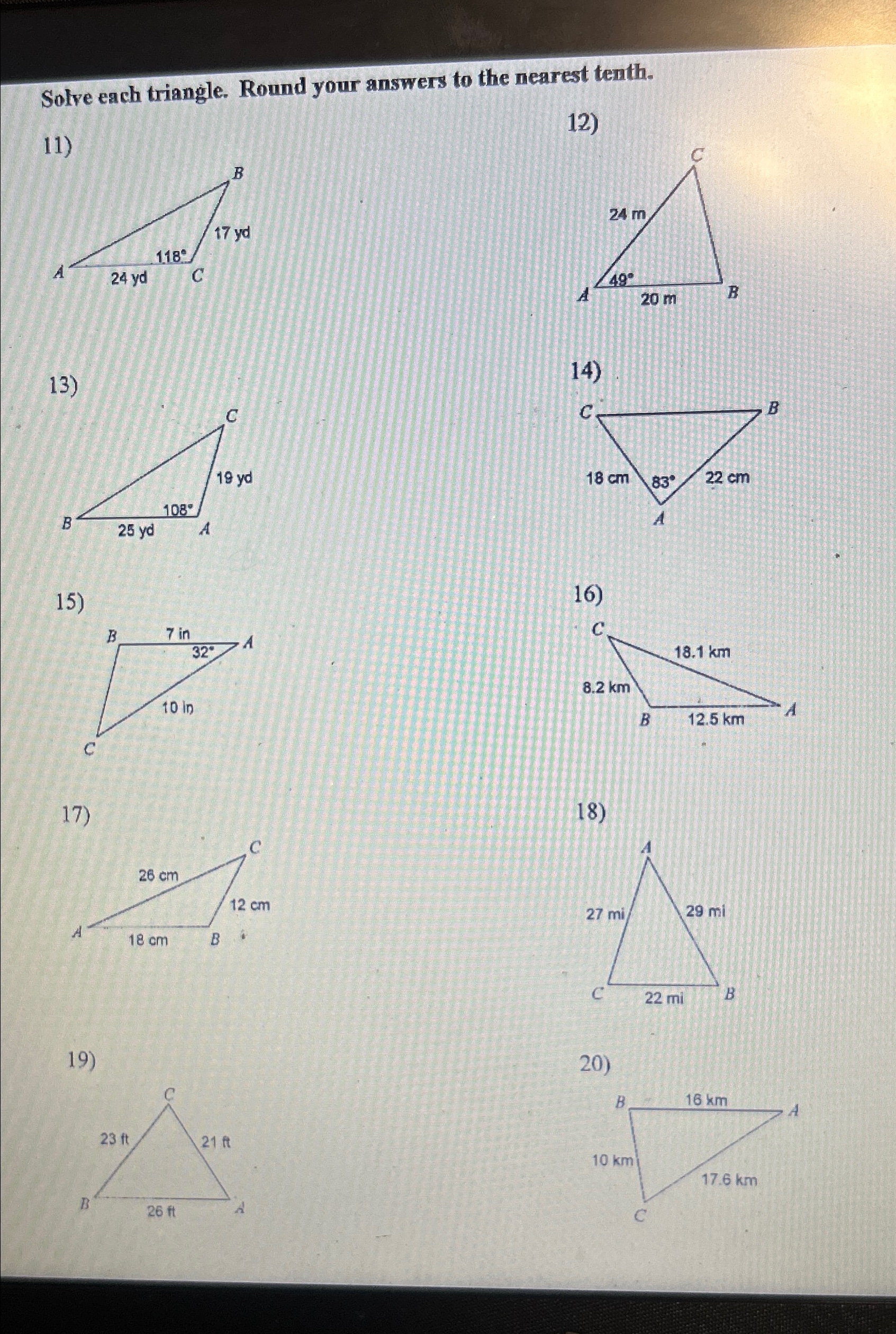 Solved Solve each triangle. Round your answers to the | Chegg.com