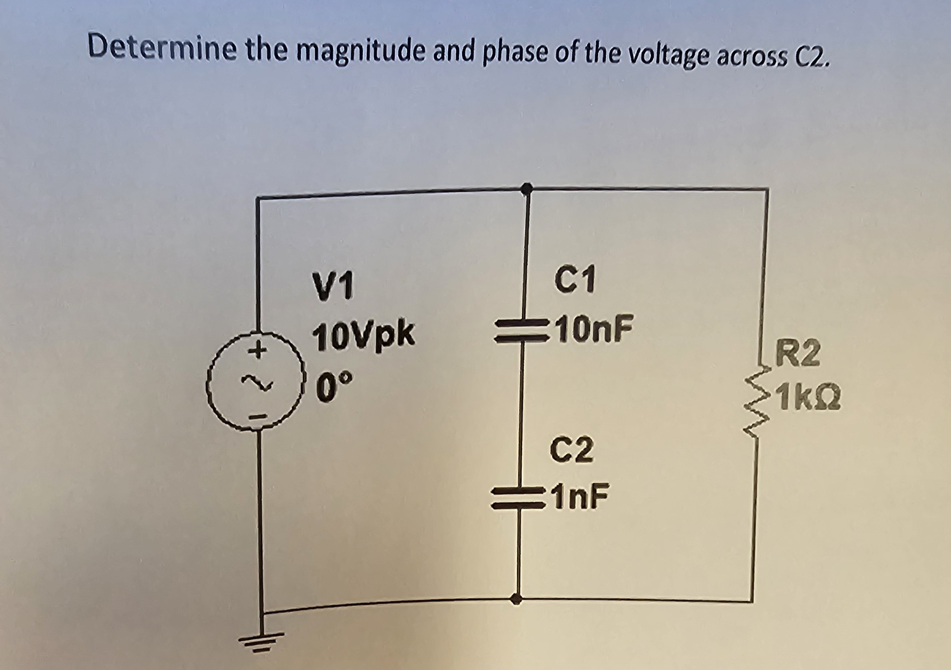 Solved Determine the magnitude and phase of the voltage | Chegg.com