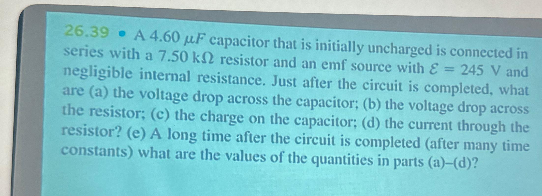 Solved 26.39 ﻿A 4.60μF ﻿capacitor that is initially | Chegg.com