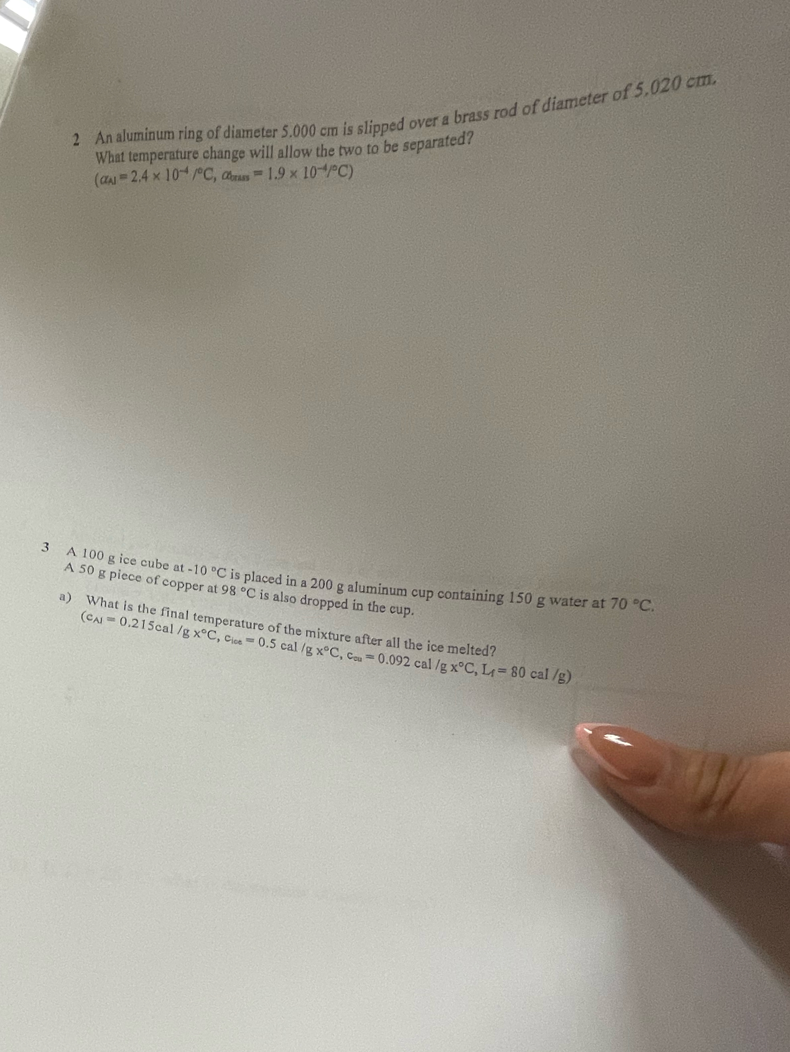 Solved 2 ﻿An aluminum ring of diameter 5.000cm ﻿is slipped | Chegg.com