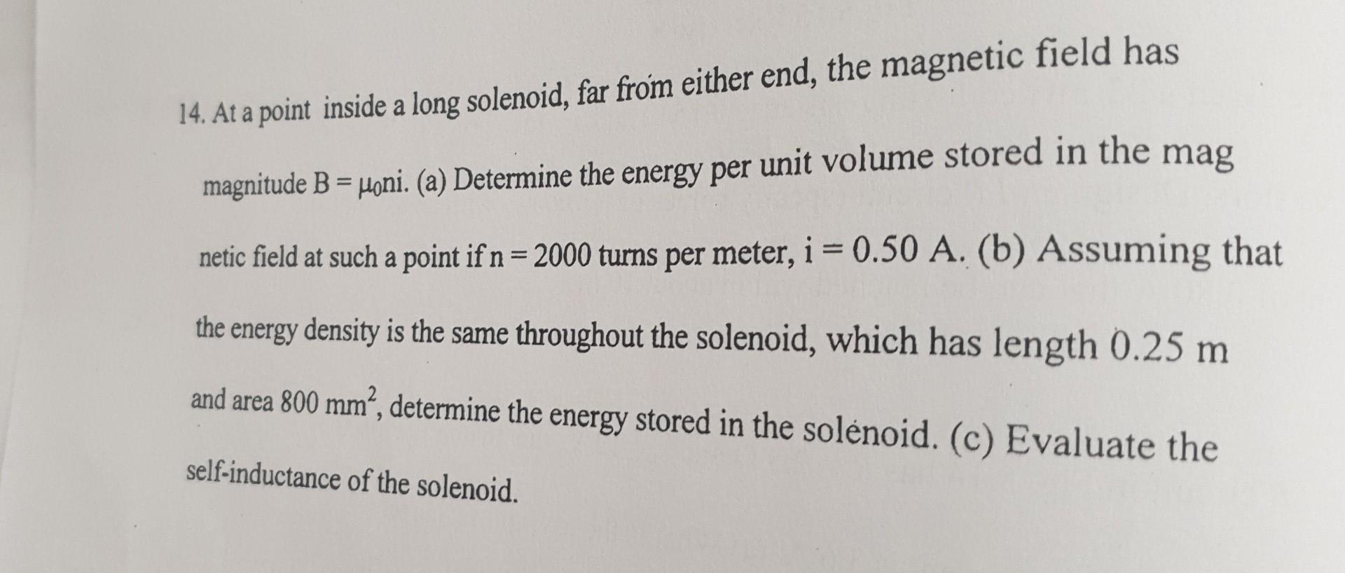 Solved 14. At a point inside a long solenoid, far from | Chegg.com