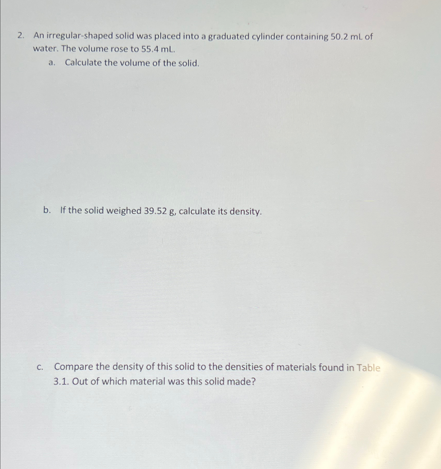 An irregular-shaped solid was placed into a graduated | Chegg.com