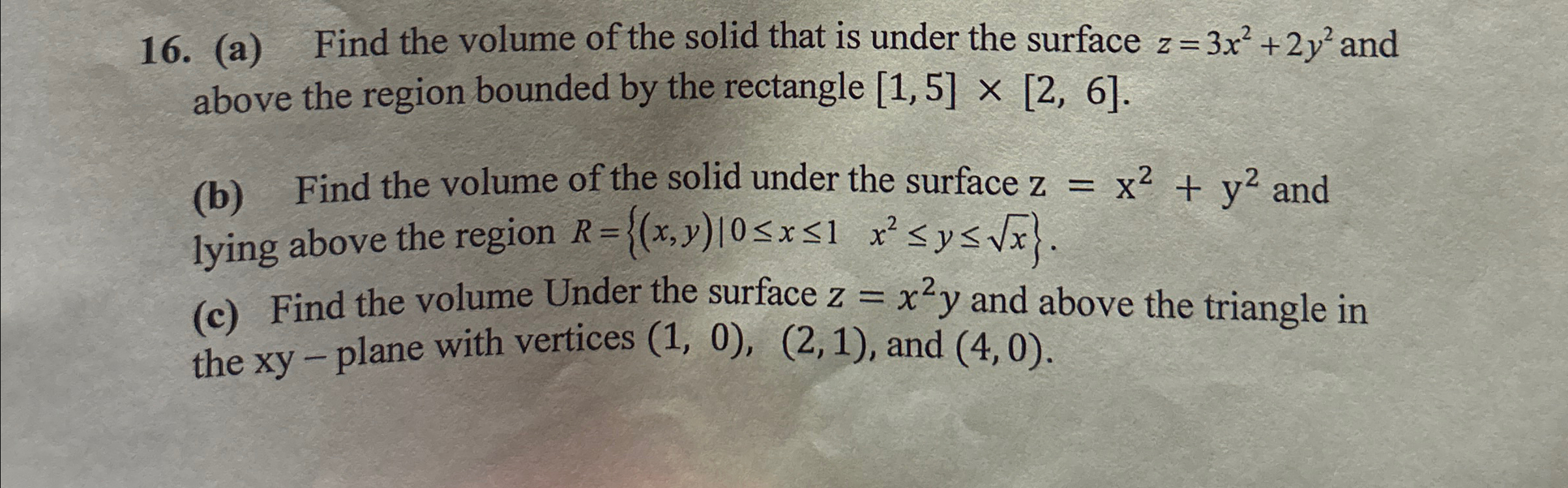 Solved (a) ﻿Find the volume of the solid that is under the | Chegg.com