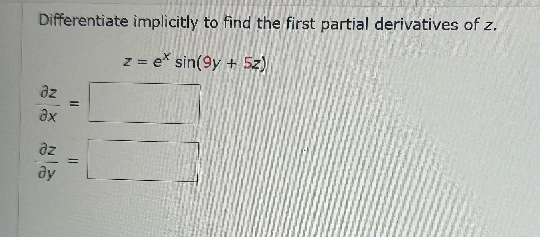 Solved Differentiate implicitly to find the first partial | Chegg.com