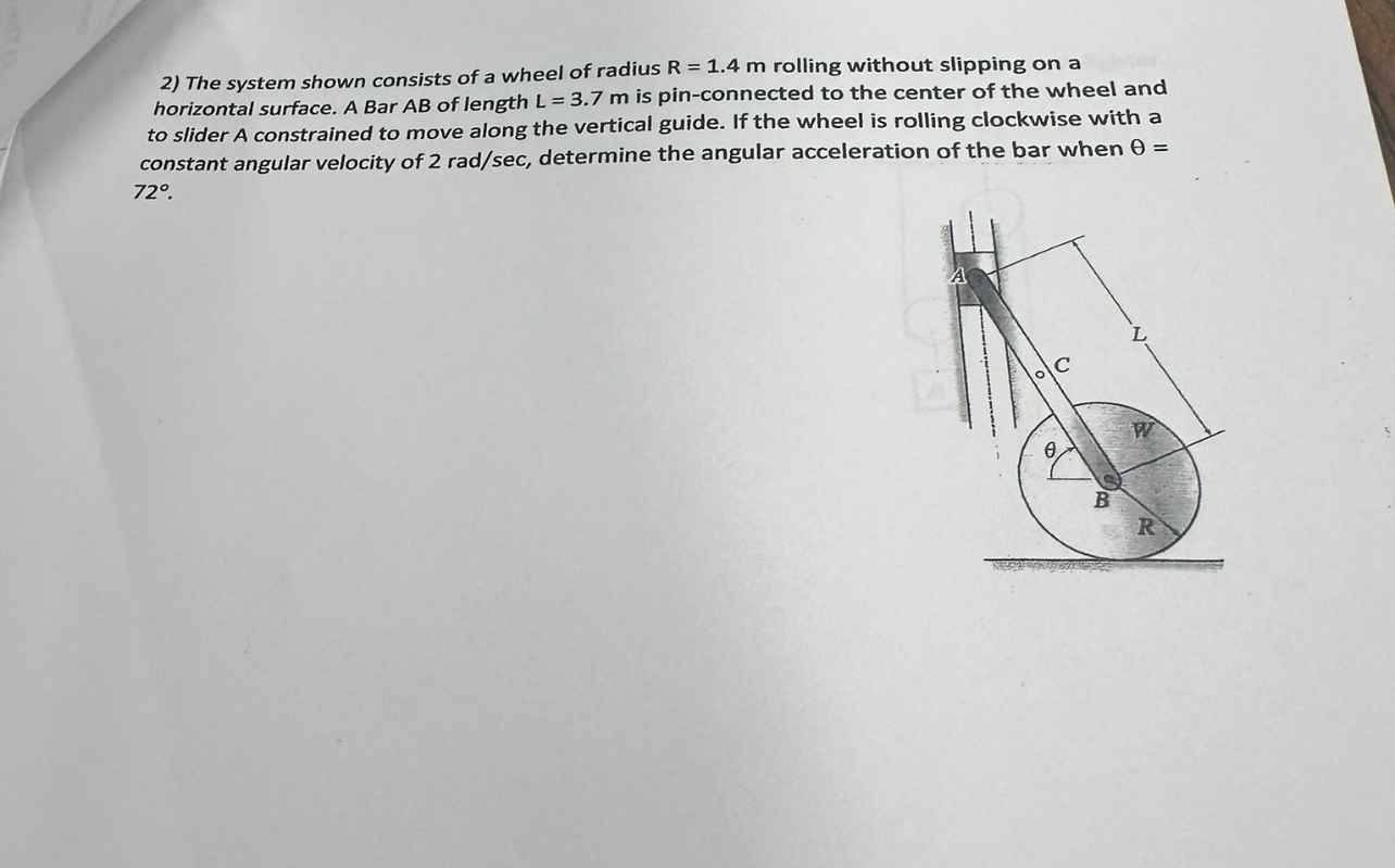 Solved The system shown consists of a wheel of radius R=1.4m | Chegg.com