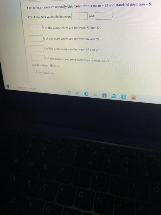 Solved A set of exam scores is normally distributed with a | Chegg.com