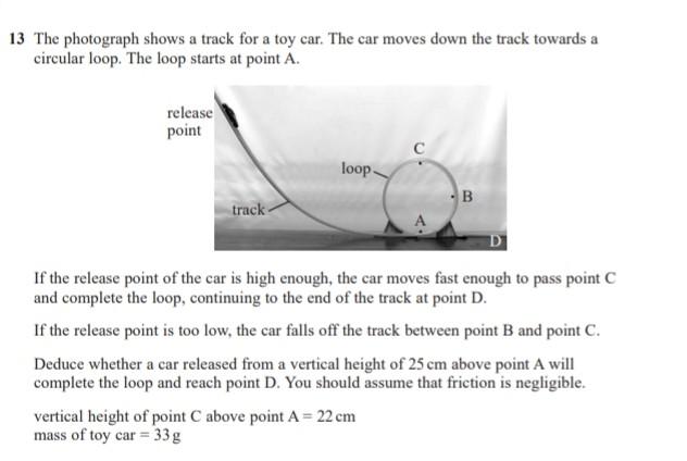 Solved 13 The Photograph Shows A Track For A Toy Car The 