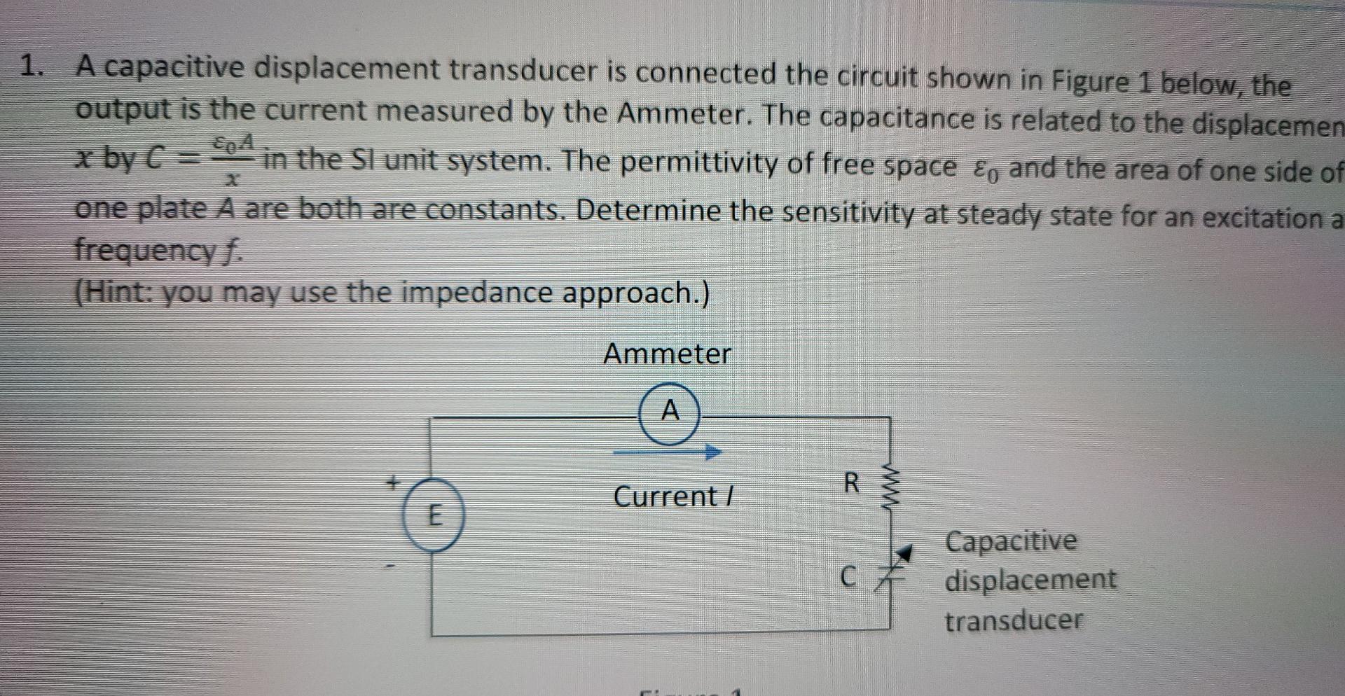 Solved 1. A capacitive displacement transducer is connected | Chegg.com