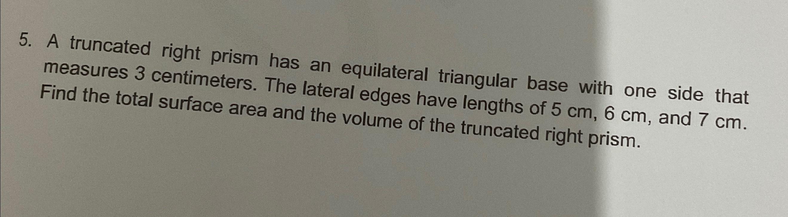 Solved A truncated right prism has an equilateral triangular | Chegg.com