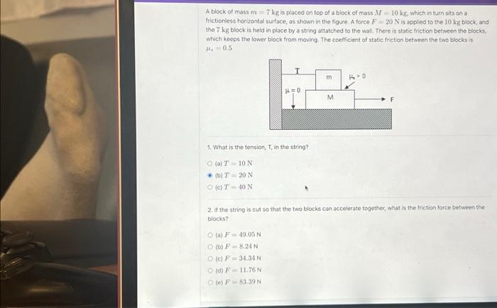 Solved A block of mass m=7 kg is placed on top of a block of | Chegg.com