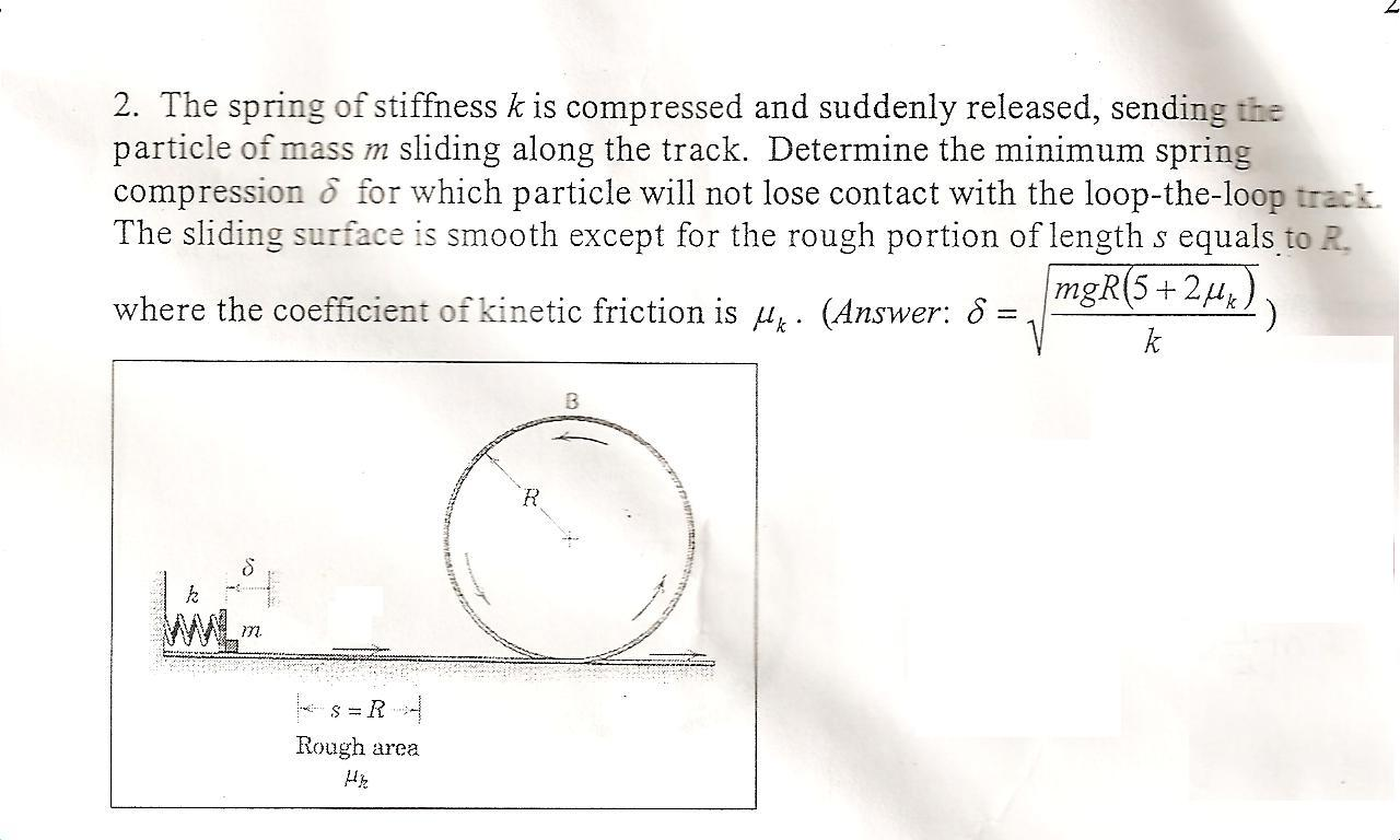 Solved The spring of stiffness k is compressed and suddenly | Chegg.com