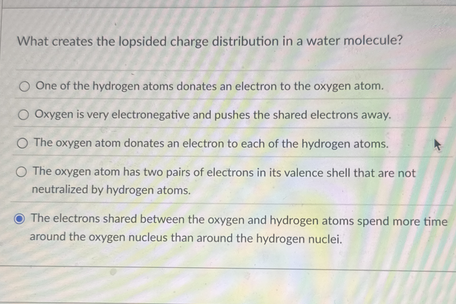 What creates the lopsided charge distribution in a | Chegg.com
