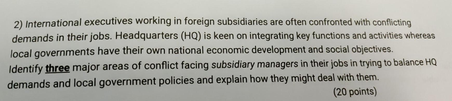 Solved 2) International executives working in foreign | Chegg.com