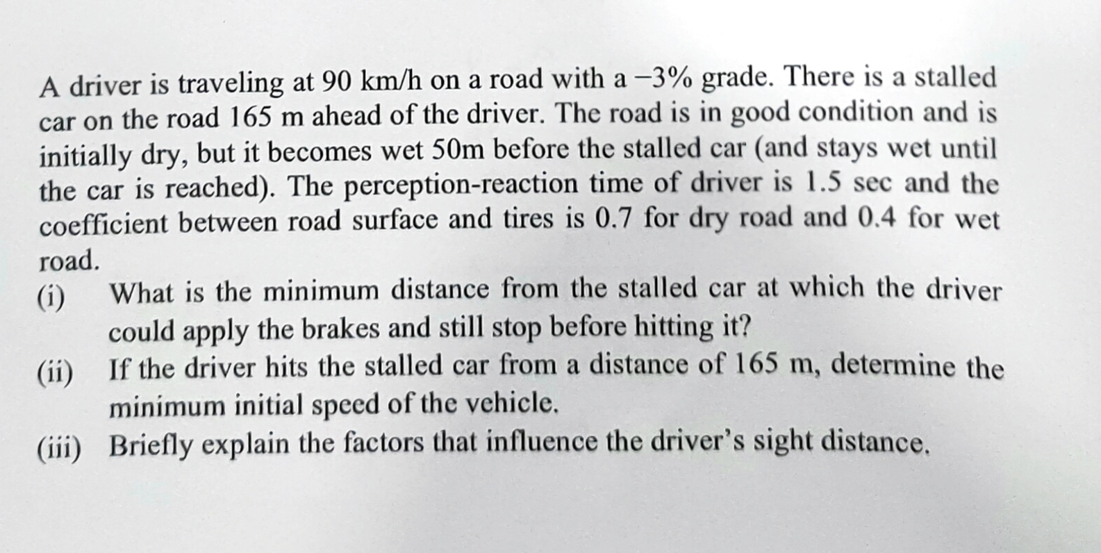 Solved A driver is traveling at 90kmh ﻿on a road with a -3% | Chegg.com