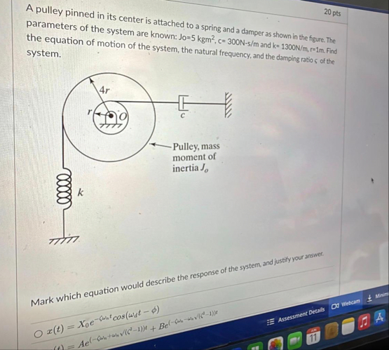 [Solved]: A pulley pinned in its center is attached to a spr