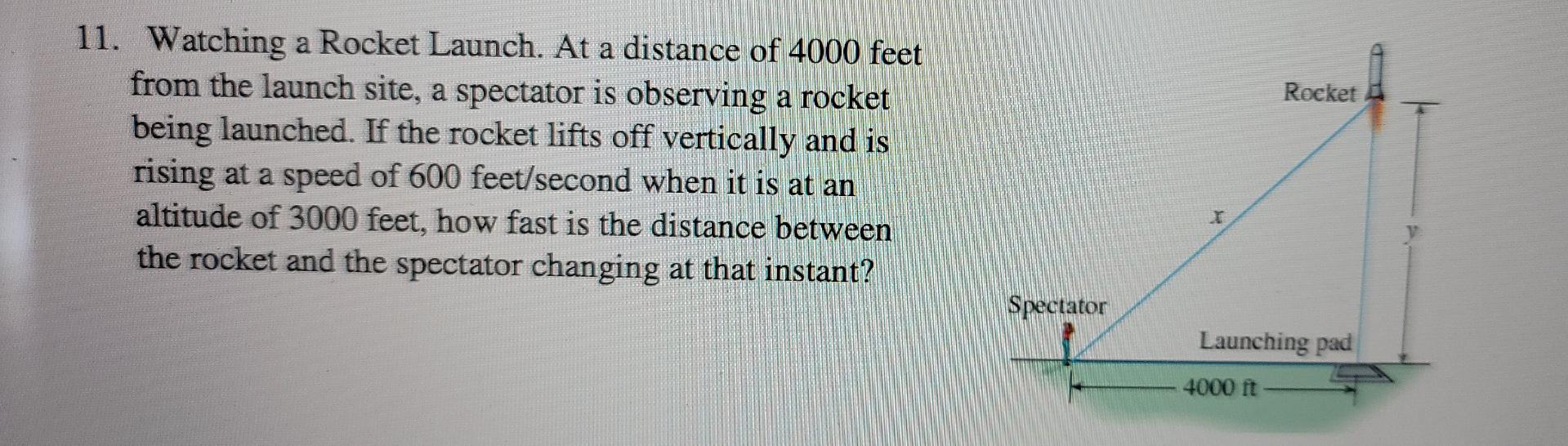 Solved a Rocket 11. Watching a Rocket Launch. At a distance | Chegg.com