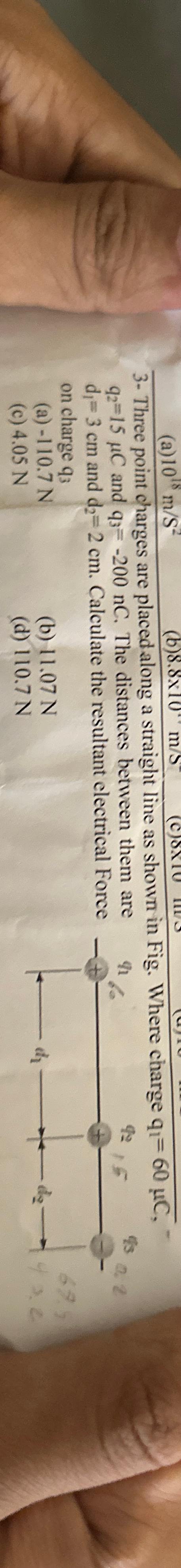 Solved 3- ﻿Three point charges are placed along a straight | Chegg.com