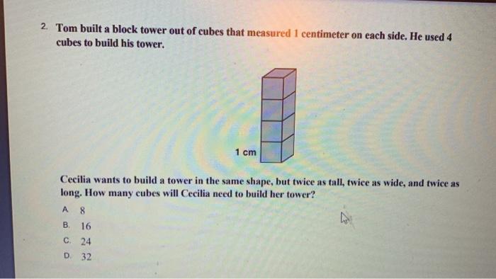 Solved 2. Tom built a block tower out of cubes that measured | Chegg.com