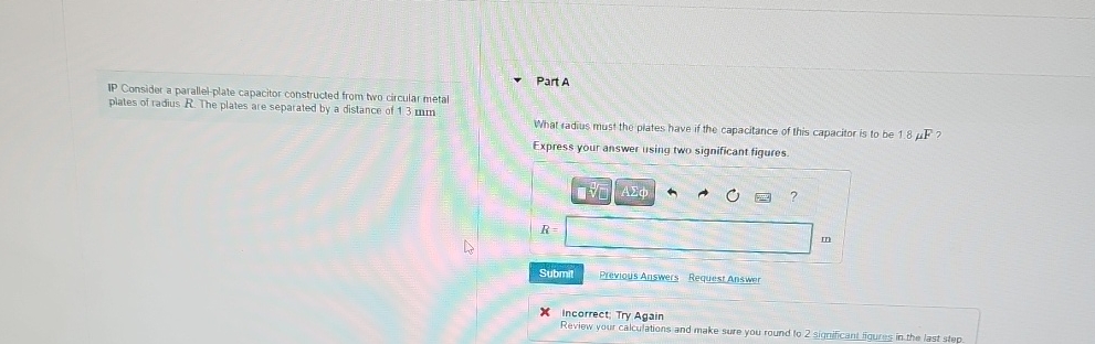 Solved IP Consider a parallel-plate capacitor constructed | Chegg.com