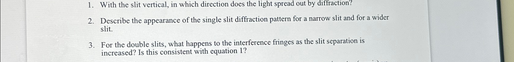 Solved With the slit vertical, in which direction does the | Chegg.com