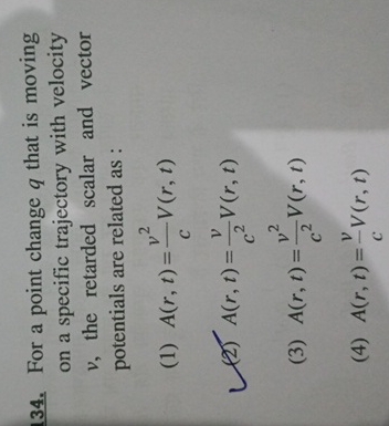 Solved by an EXPERT For a point change q ﻿that is moving on a specific | Chegg.com