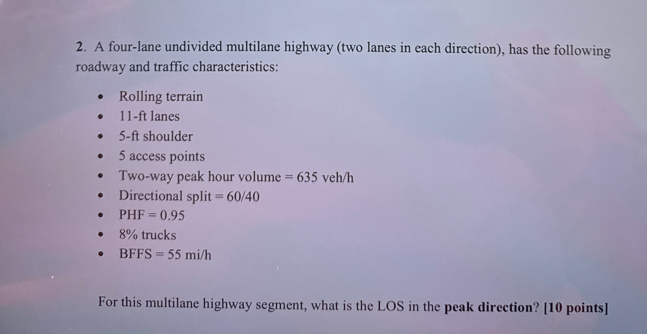 Solved A four-lane undivided multilane highway (two lanes in | Chegg.com